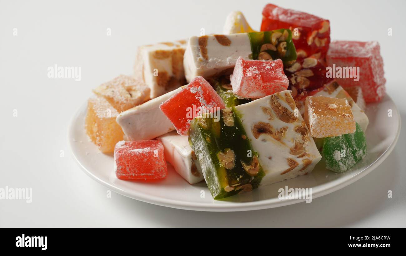 Assorted Turkish delights Rahat lokum. Colorful cubes of Turkish ...