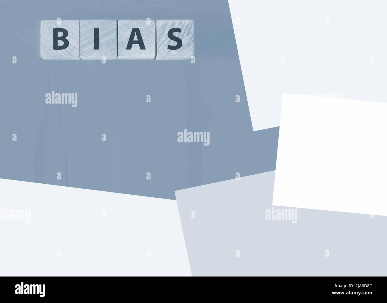 the word bias on wooden blocks blue background Stock Photo - Alamy
