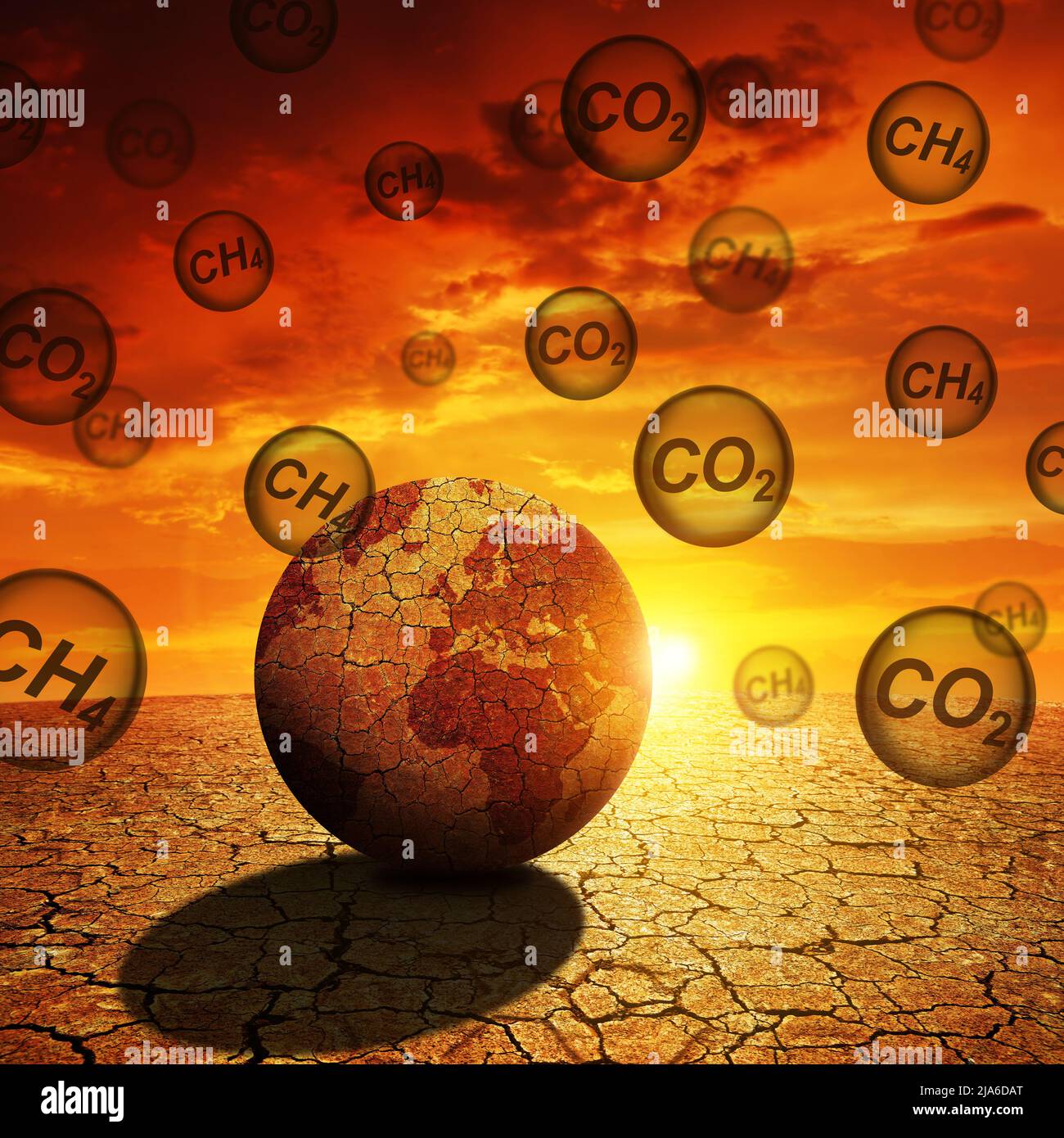 Parched planet earth in the dry landscape with cracked soil at sunset ...