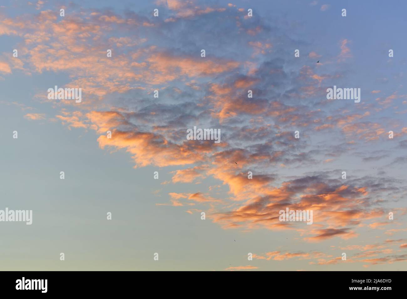 sunset sky with the light of the sun behind Stock Photo - Alamy
