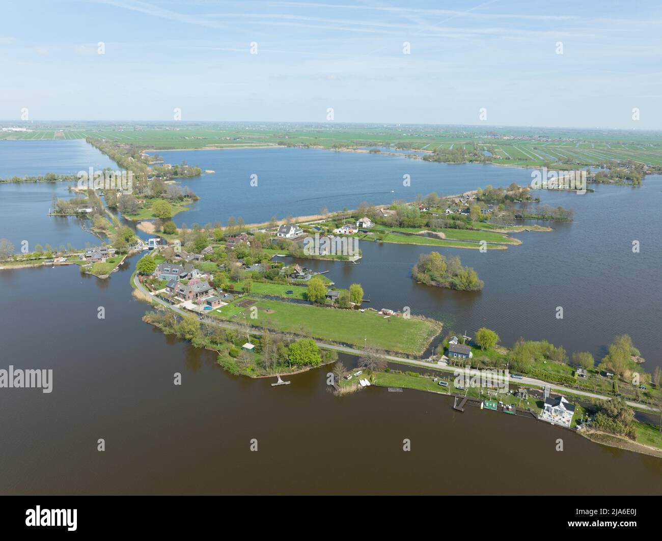 Typical dutch nature lake scenery at a sunny day. Reeuwijkse plannen in ...