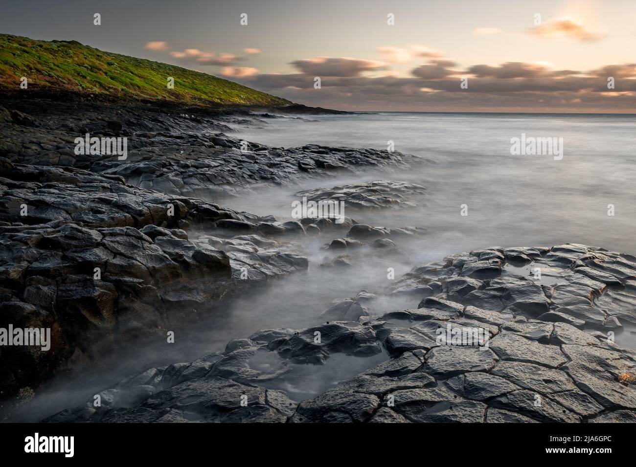 Ancient basalt formations at Black Point in D'Entrecasteaux National ...