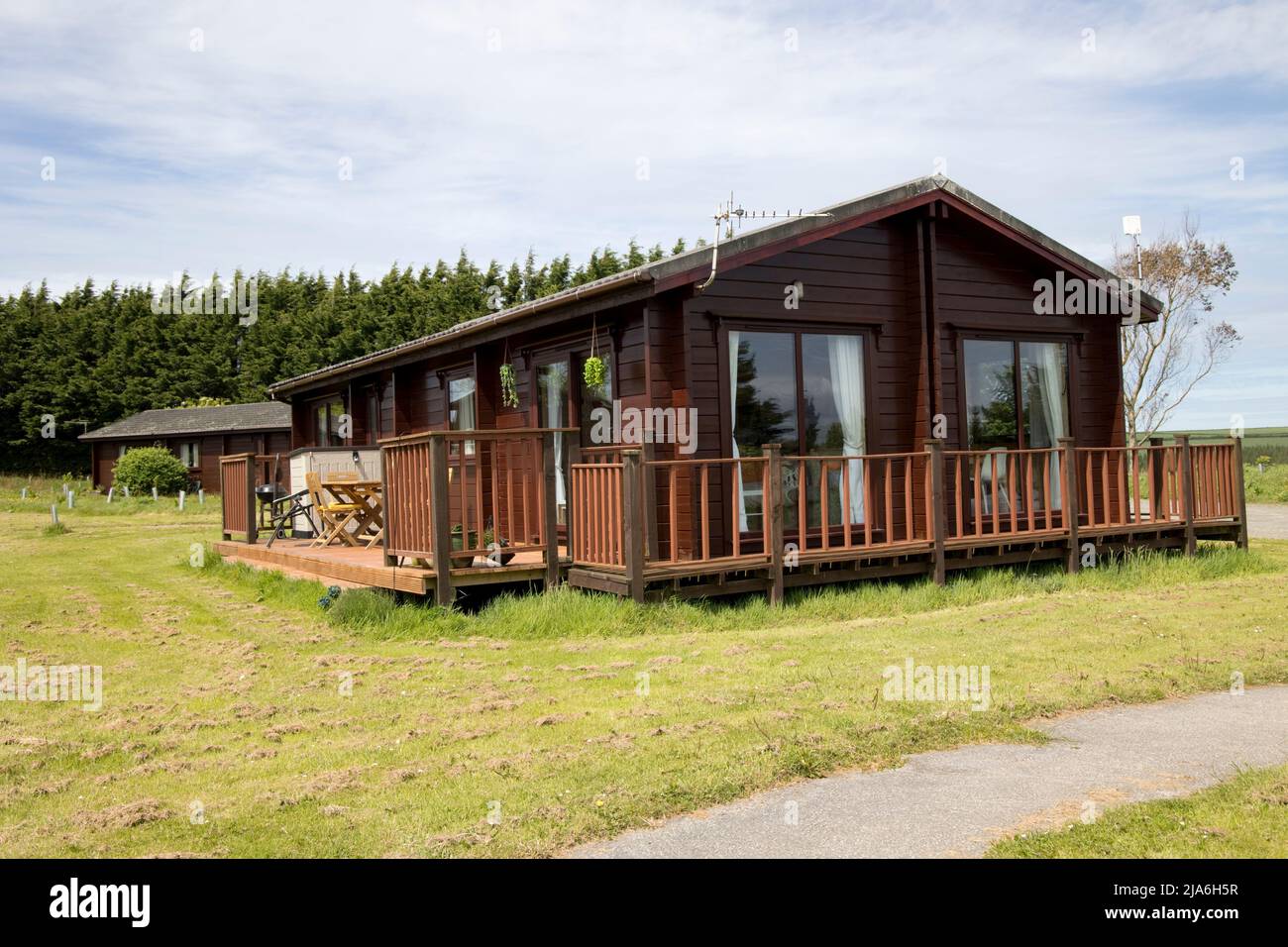 Log cabin used as holiday home for rent North Devon UK Stock Photo - Alamy