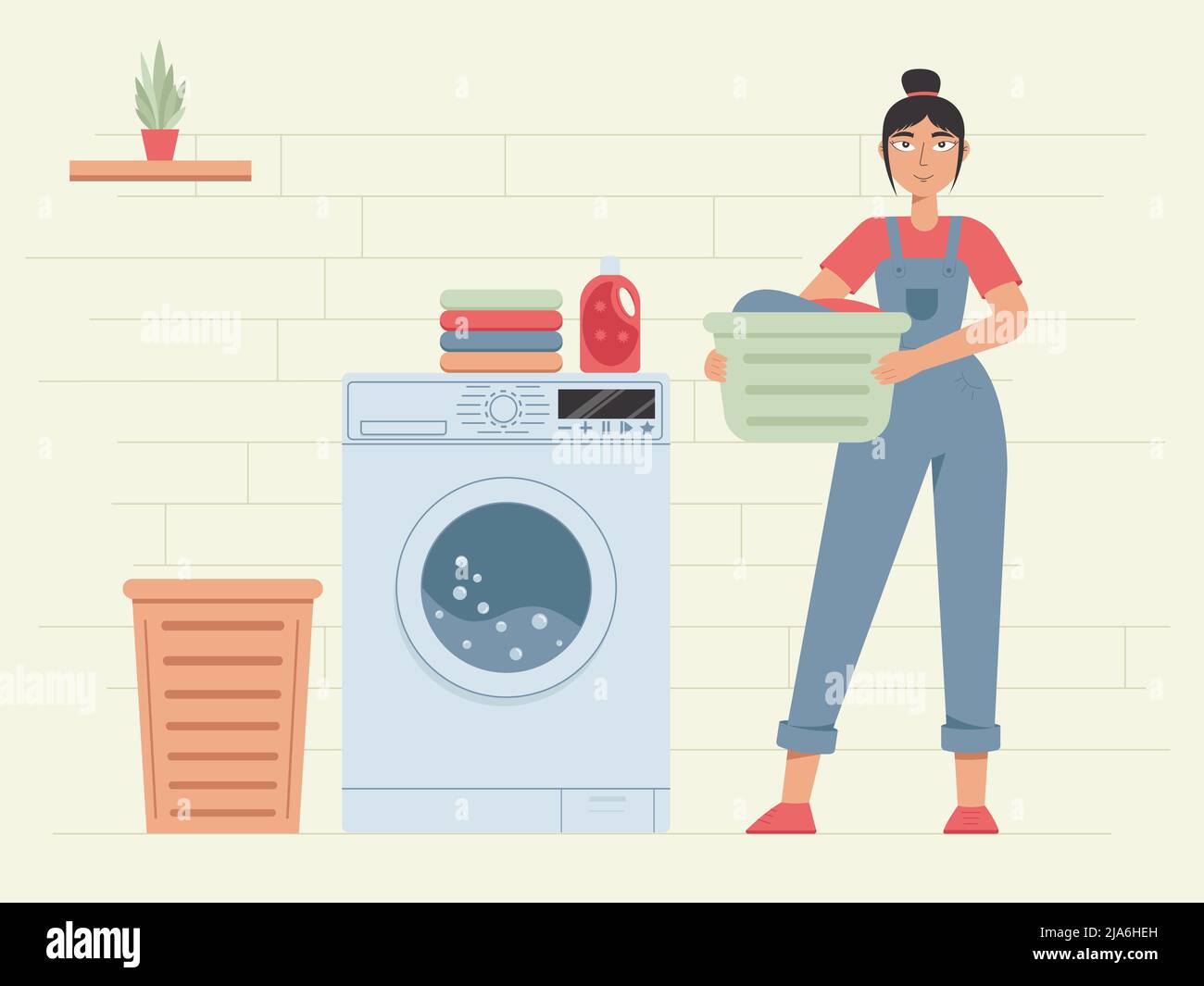 Happy woman doing laundry. Woman holding backet with clean clothes ...