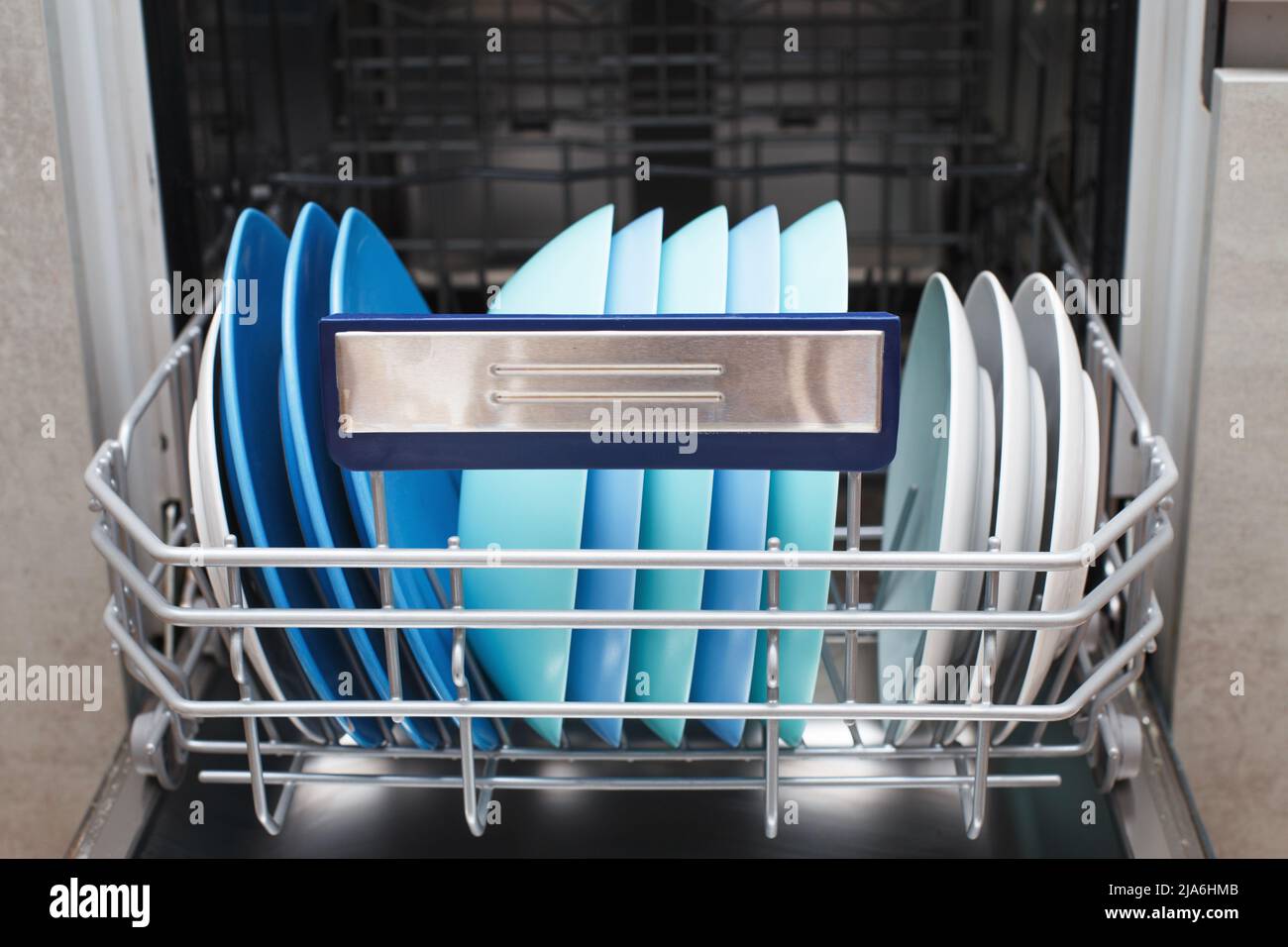 Open dishwasher with a clean dishes in the kitchen Stock Photo - Alamy