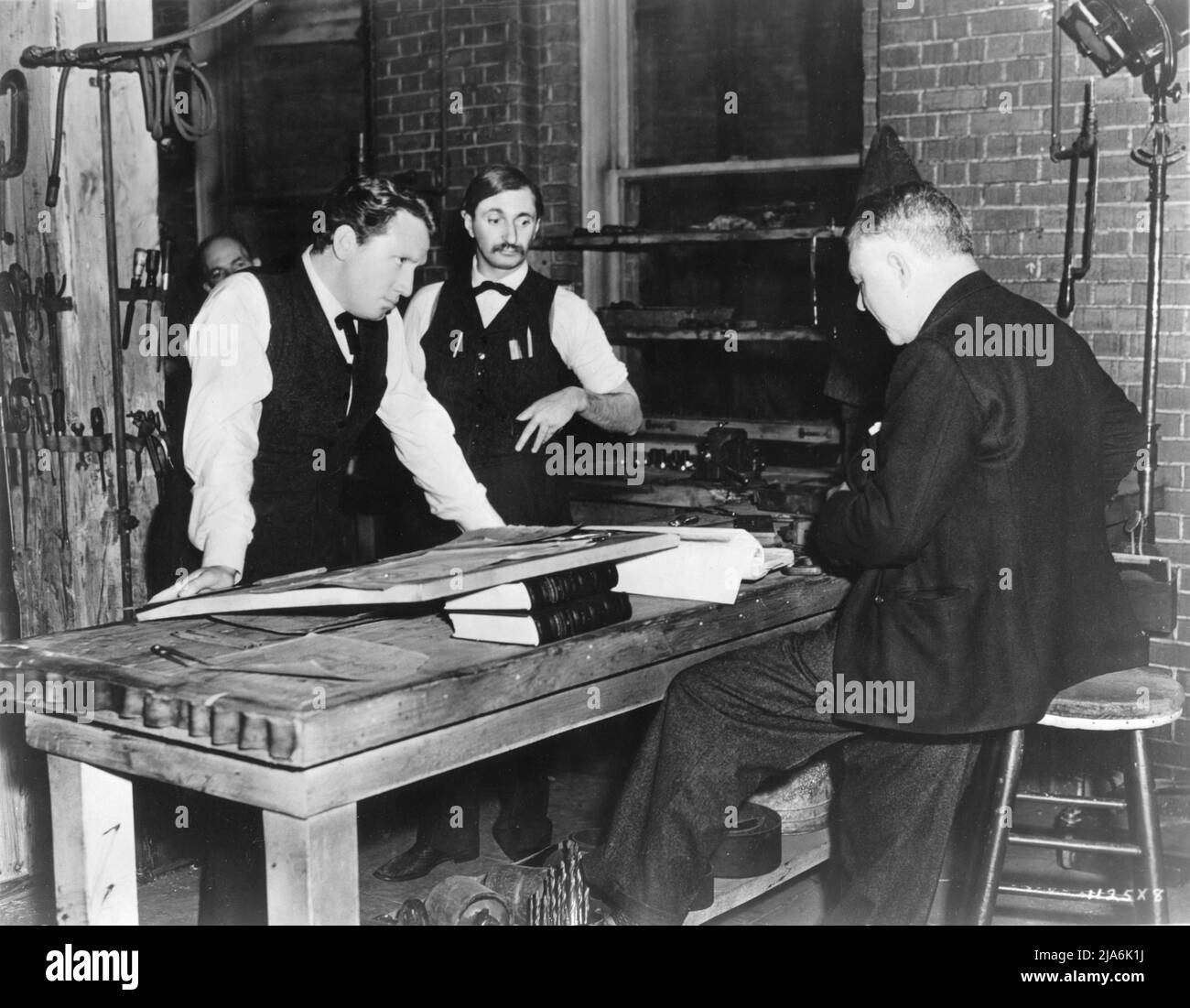 SPENCER TRACY as Thomas Edison and FELIX BRESSART with Director ...