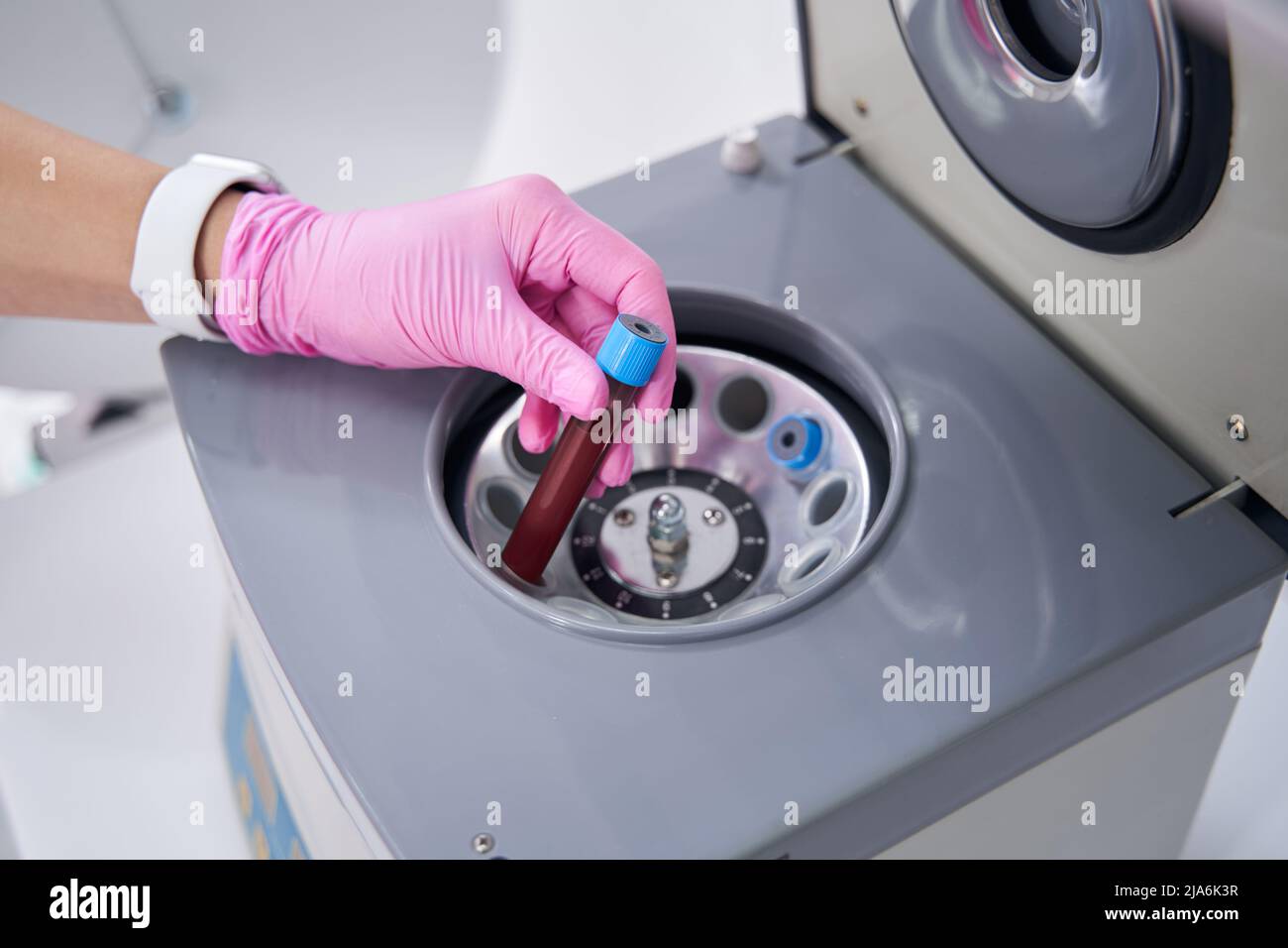 Tubes filled with blood are in plasma-lifting centrifuge in laboratory ... Tubes filled with blood are in plasma-lifting centrifuge in laboratory ...
