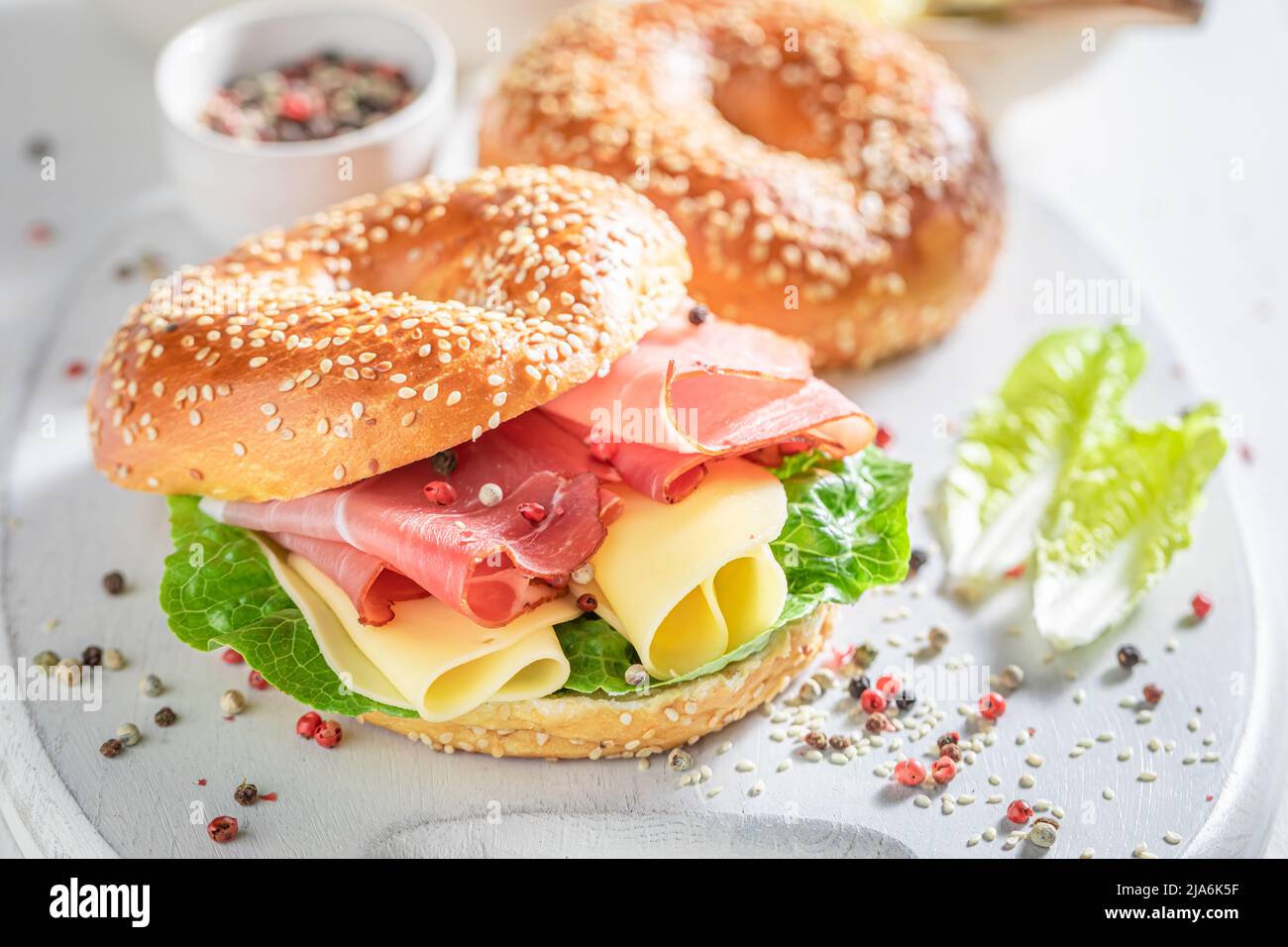 Homemade and crunchy bagel with ham and cheese. Bagels with healthy and ...