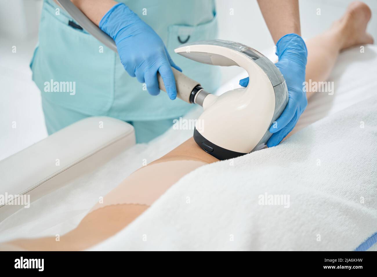 Vela shape contouring technology used on client leg Stock Photo - Alamy