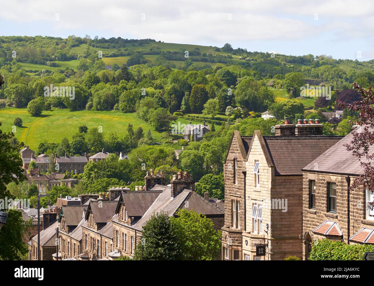 View over houses and hills in Matlock Town, Derbyshire, UK Stock Photo ...