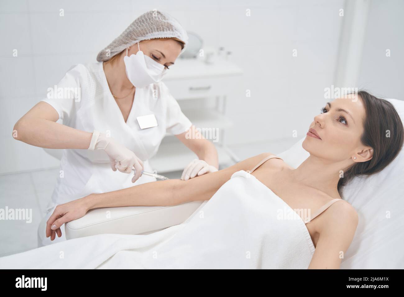 Subcutaneous injection arm hi-res stock photography and images - Alamy