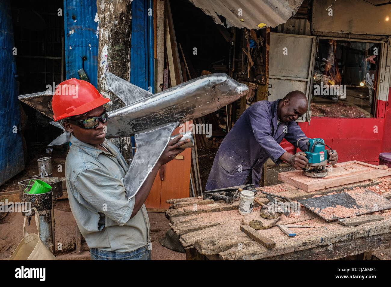 Nairobi, Kenya. 17th May, 2022. A metalsmith and a carpenter from ...