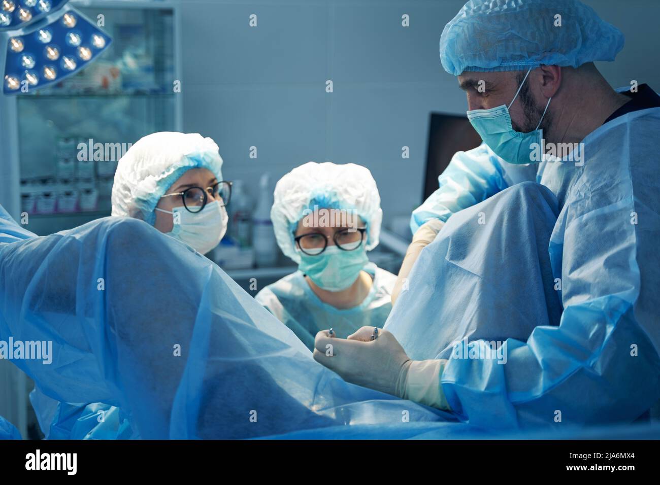 Group doctors perform operation patient hi-res stock photography and ...