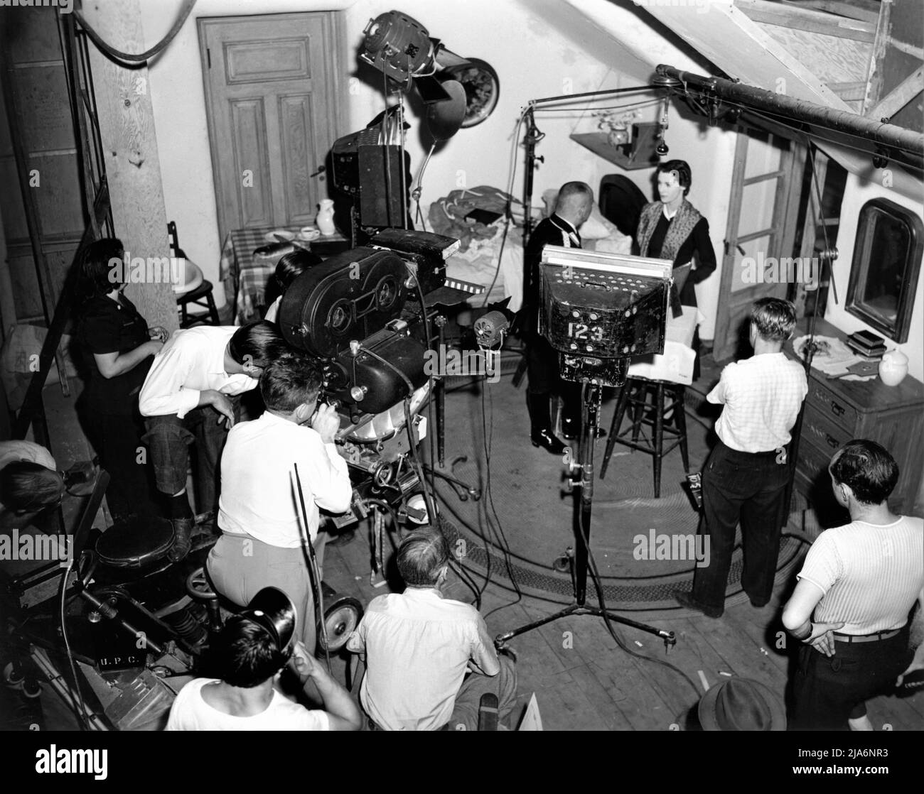 Cinematographer WILLIAM H. DANIELS (looking through lens) and Movie ...