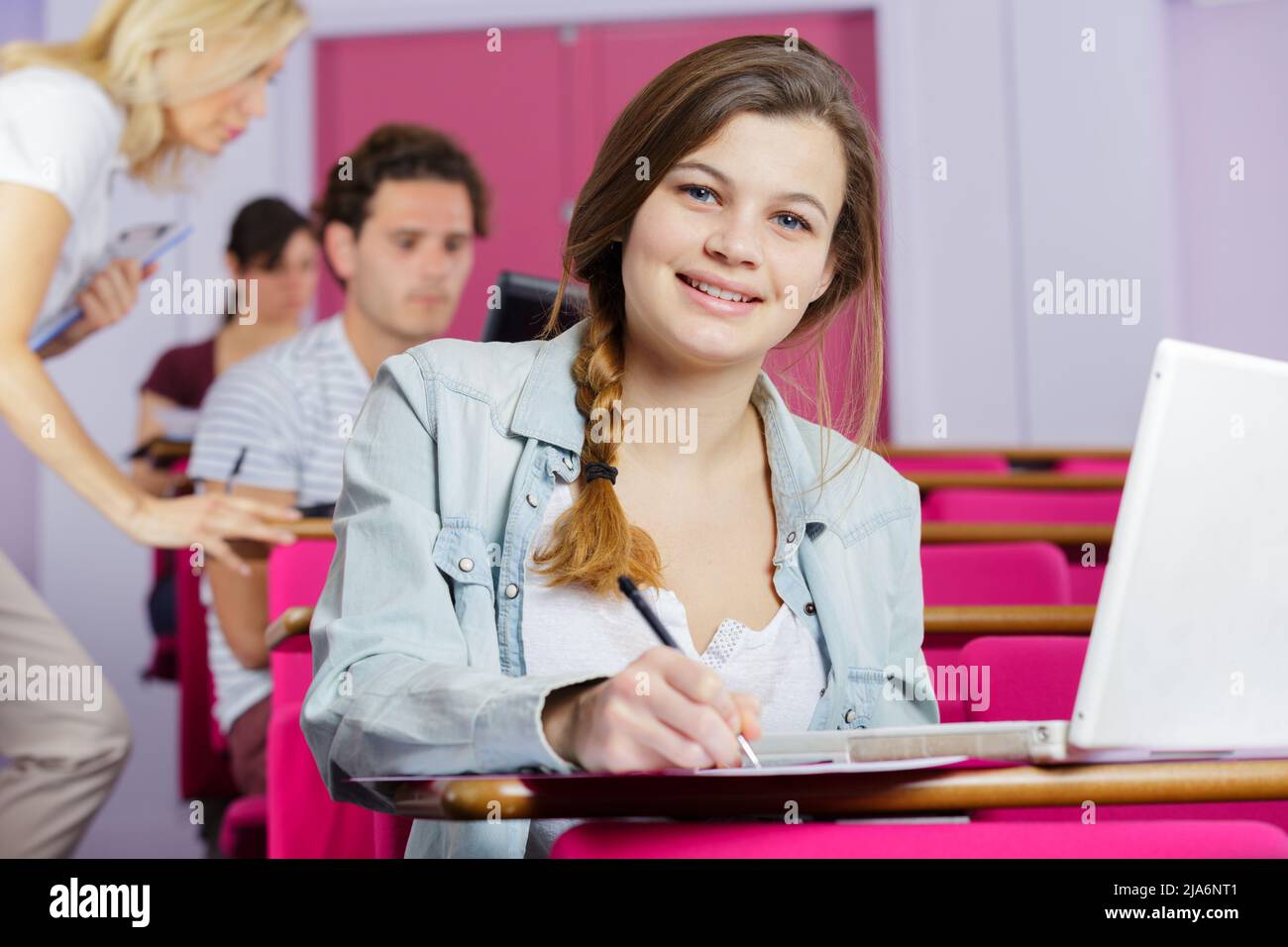 female student looking at camera Stock Photo - Alamy