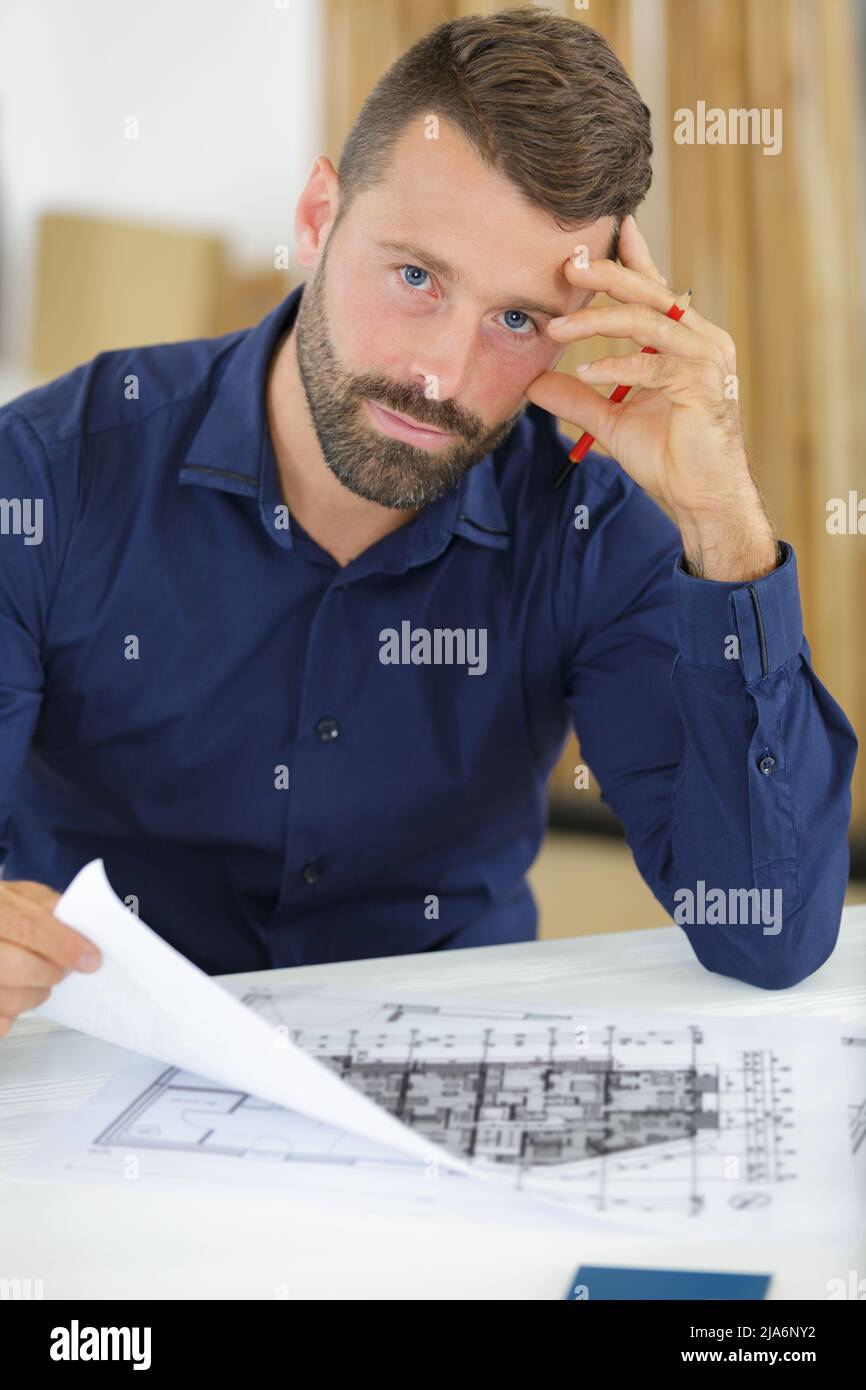 architect man working with blueprints Stock Photo - Alamy