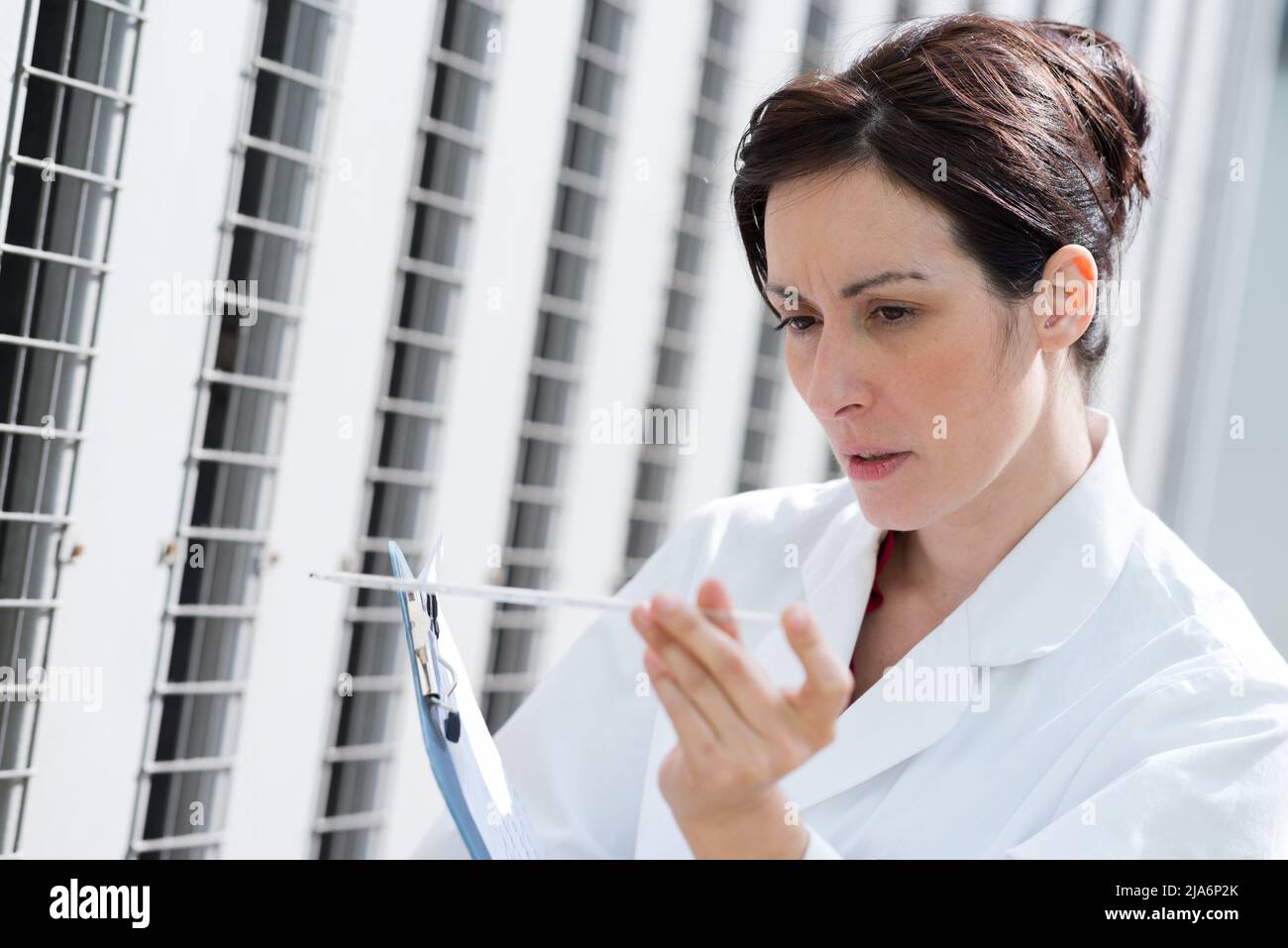 portrait of scientist checking experiment results Stock Photo - Alamy