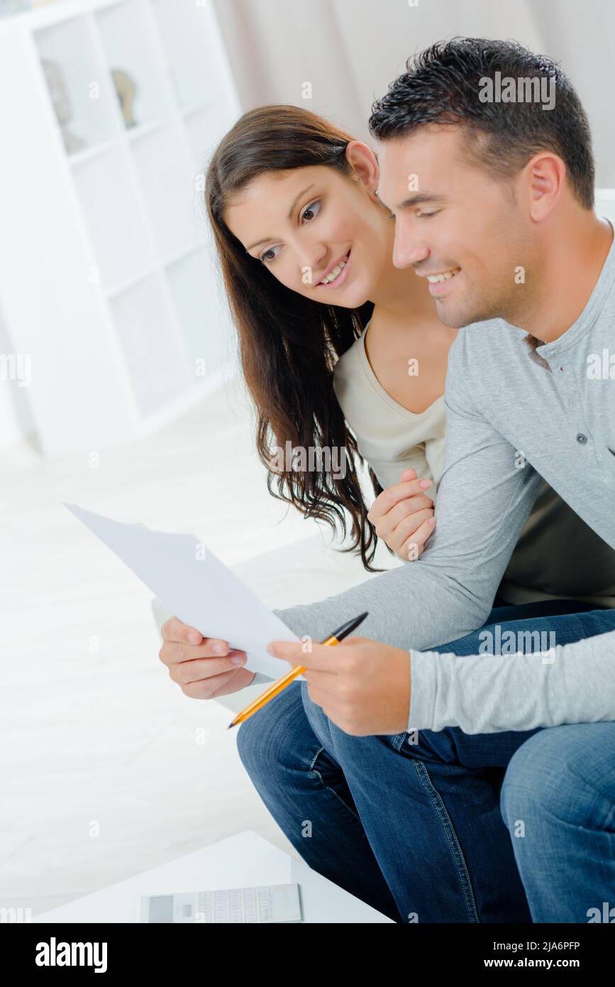 a couple is reading letter Stock Photo - Alamy