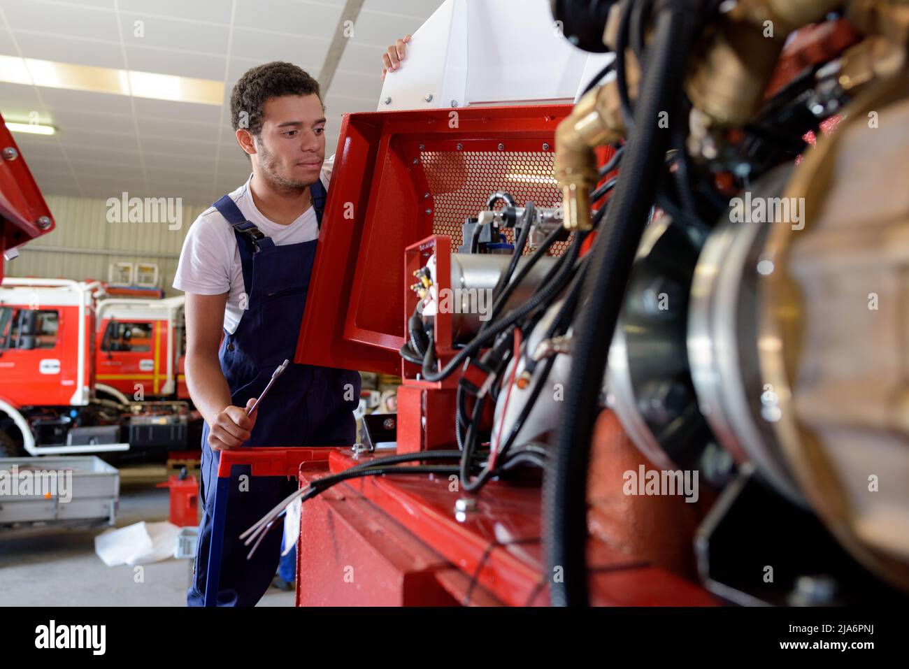 industrial worker in a garage Stock Photo - Alamy