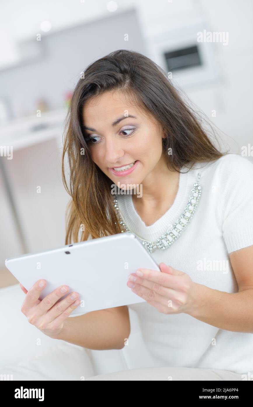 a young girl on tablet Stock Photo - Alamy