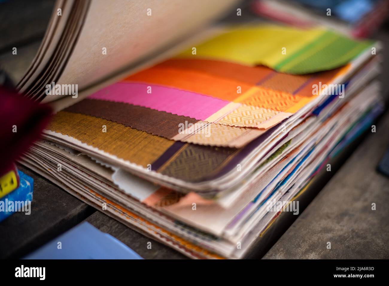 Cloth fabric book - Cotton thread and seeds textiles garments Stock ...