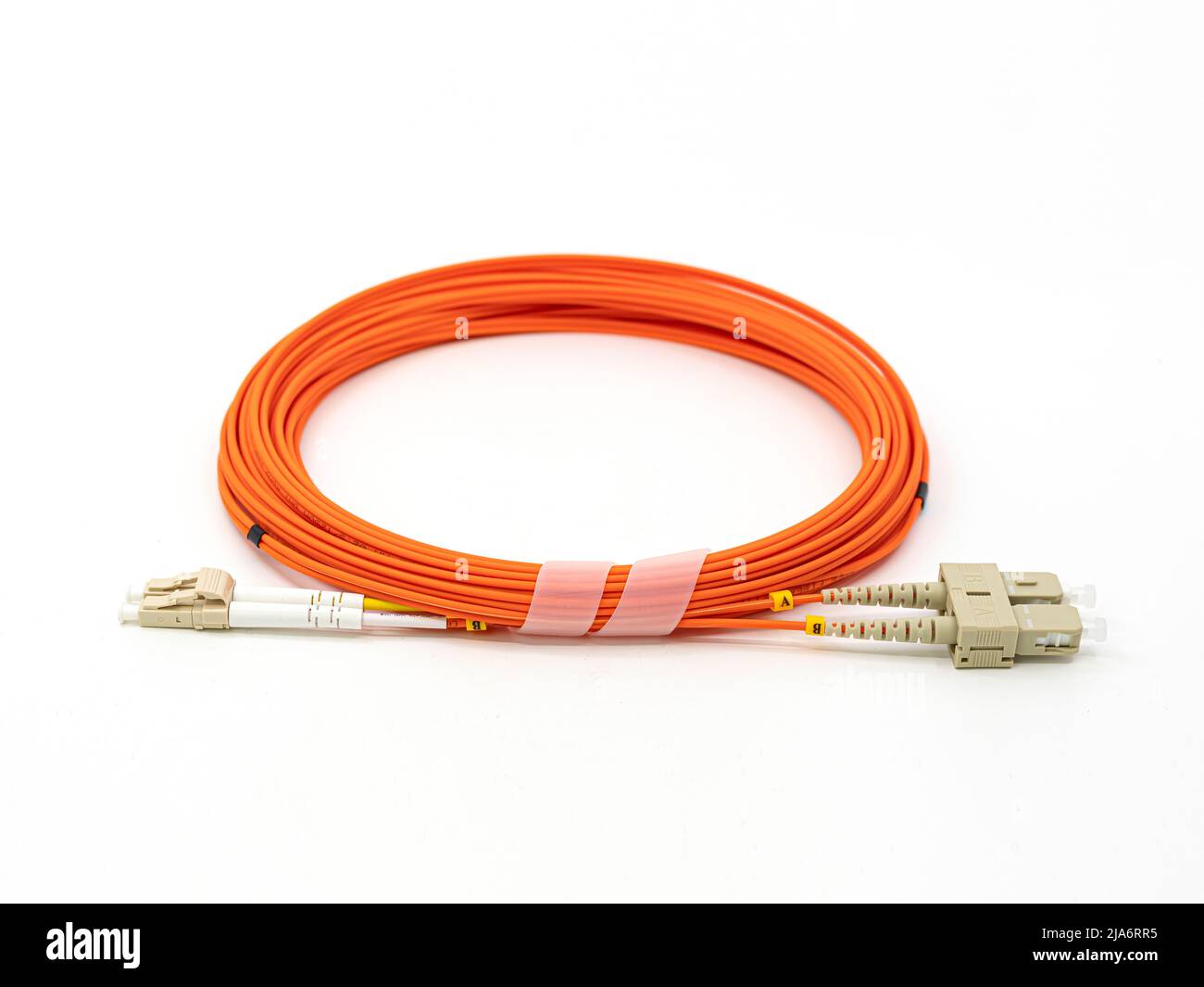 Fiber Optic Patch Cord on isolated white background Stock Photo - Alamy