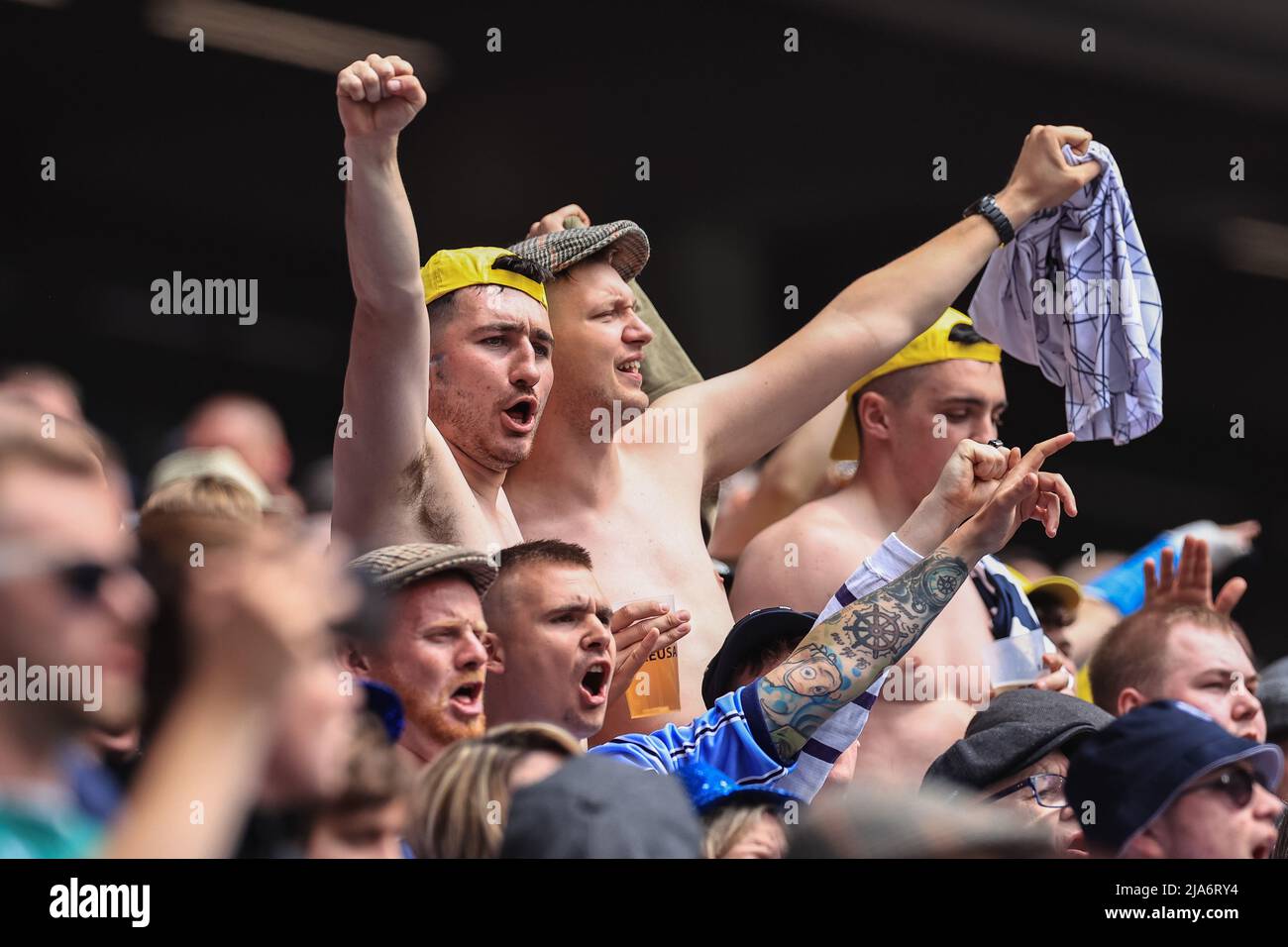 Featherstone Rovers fans sing the National Anthem Stock Photo - Alamy