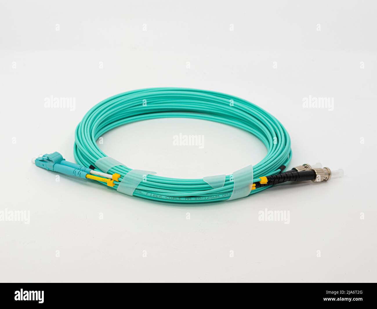 Fiber Optic Patch Cord on isolated white background Stock Photo - Alamy