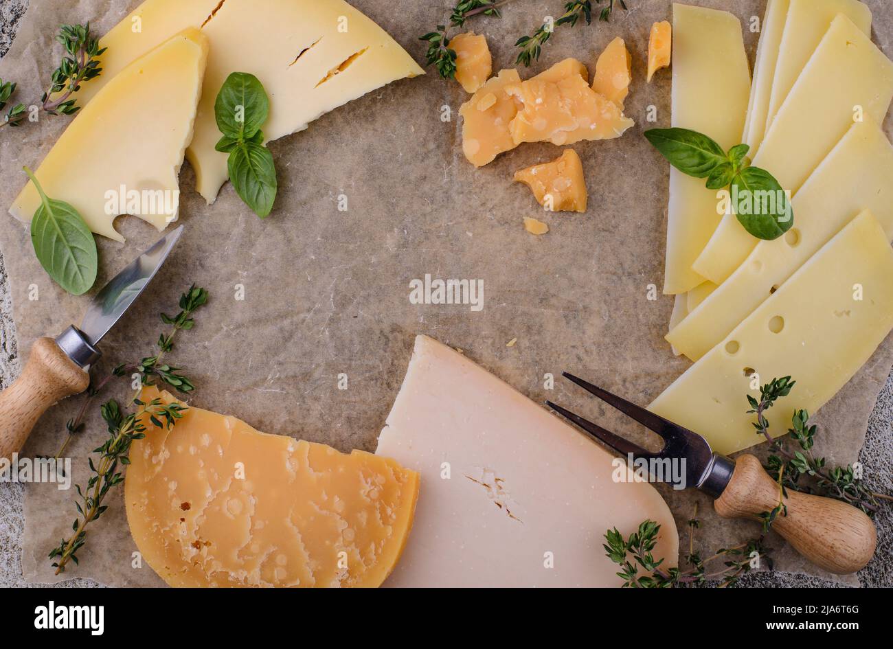 Parmesan, cheddar, gouda and maasdam cheese Stock Photo - Alamy