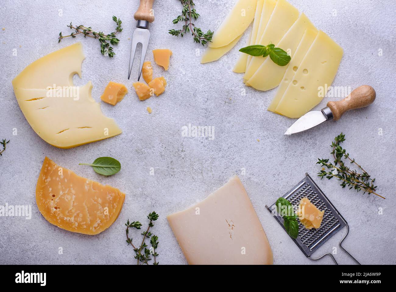 Parmesan, cheddar, gouda and maasdam cheese Stock Photo - Alamy