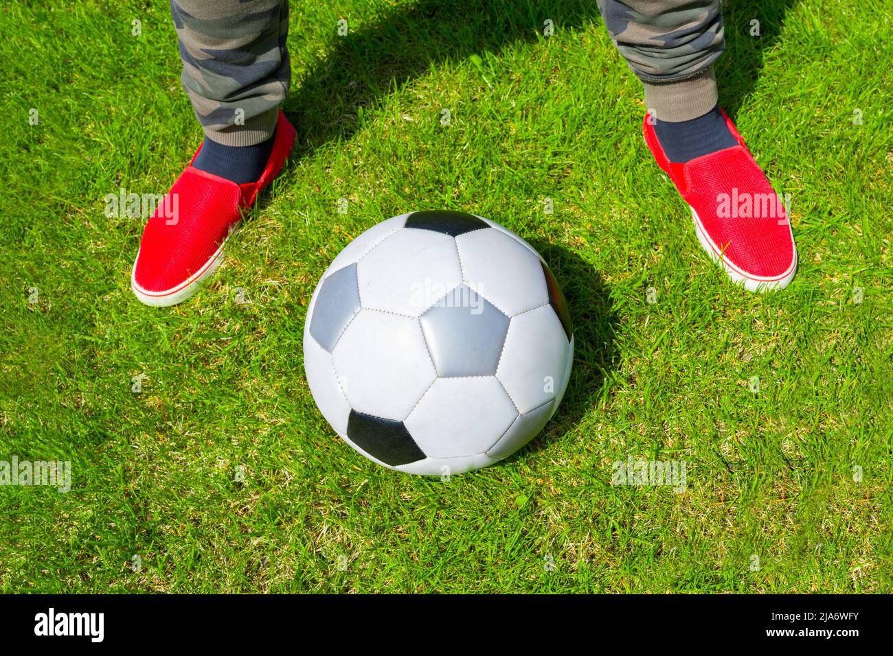 Soccer football player standing feet hi-res stock photography and ...