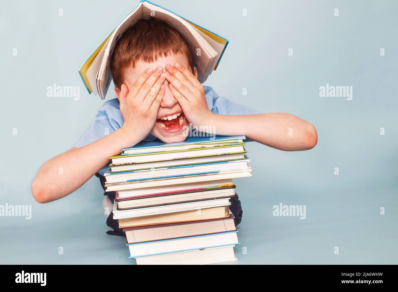 Boy cry classroom book hi-res stock photography and images - Alamy