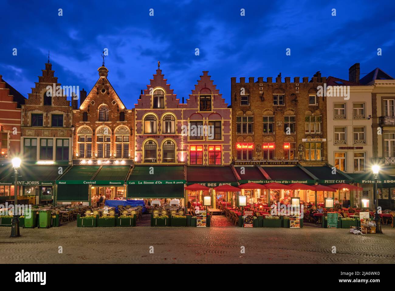 Bruges Grote markt square famous tourist place with many cafe and ...
