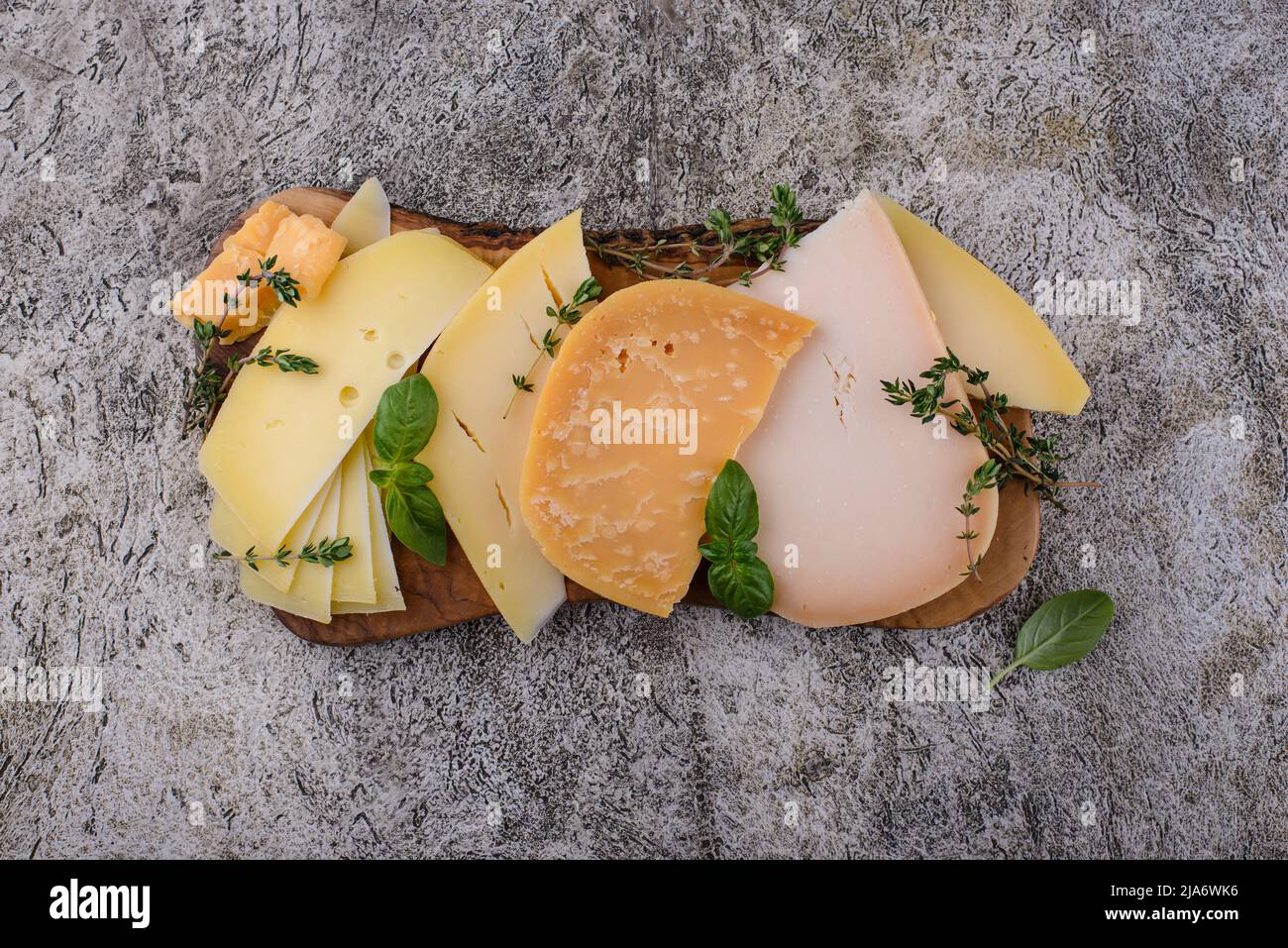 Parmesan, cheddar, gouda and maasdam cheese Stock Photo - Alamy