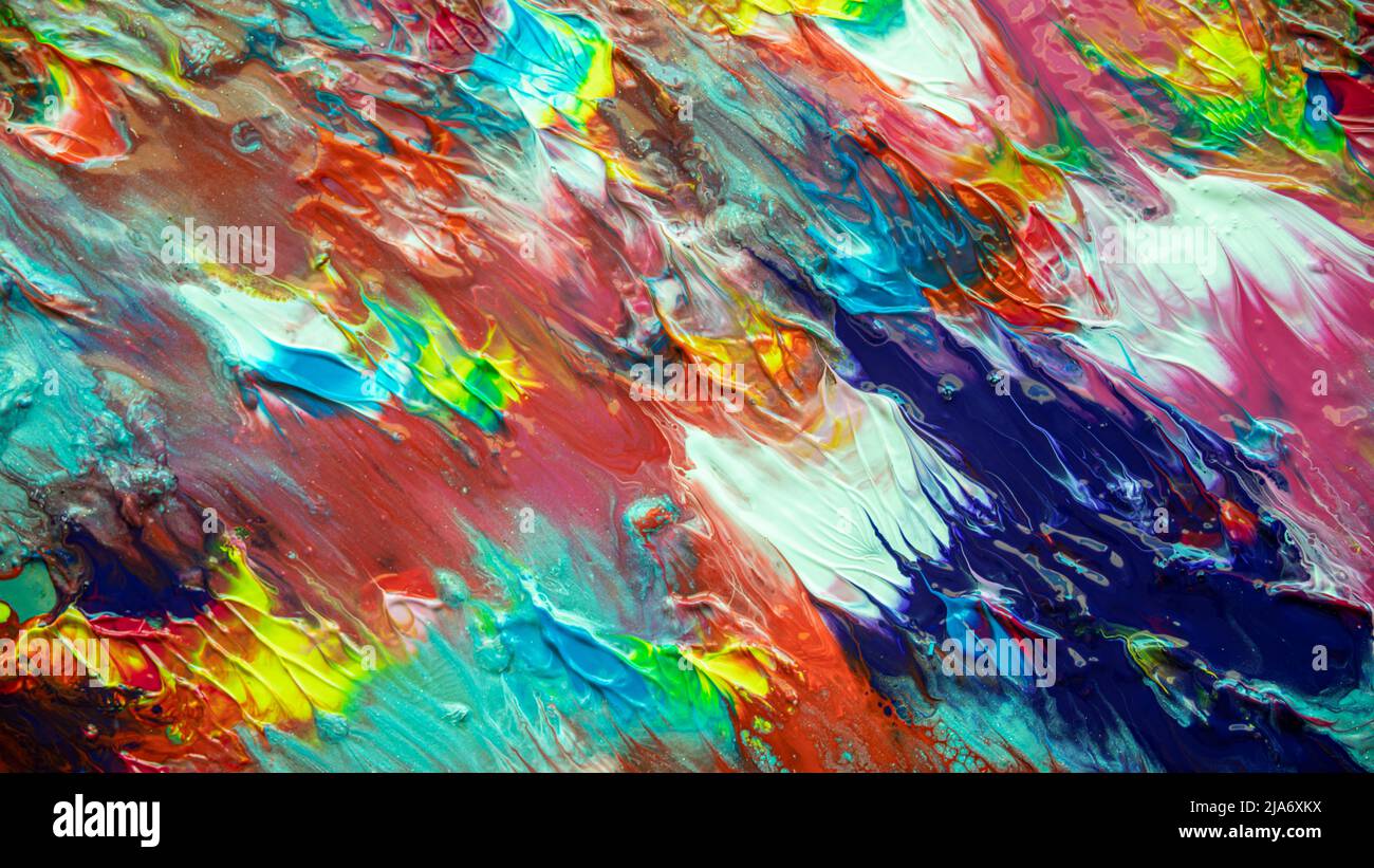 Texture created with paint in vibrant and diverse colors that create a ...