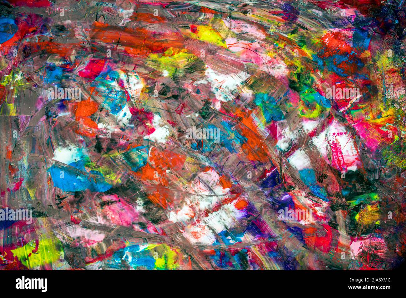 Texture created with paint in vibrant and diverse colors that create a ...