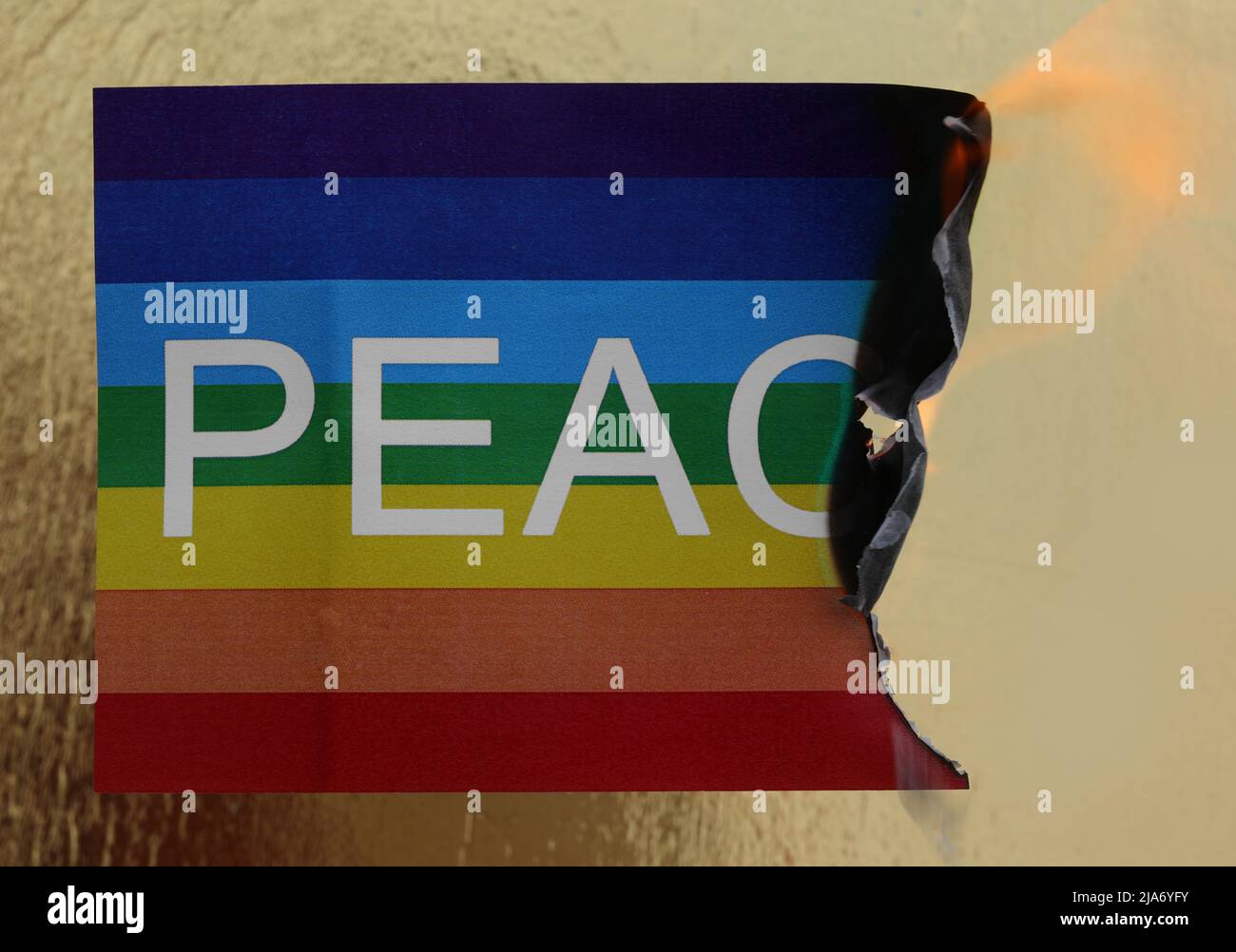 large banner with the word peace and fire burning it symbolizing war ...