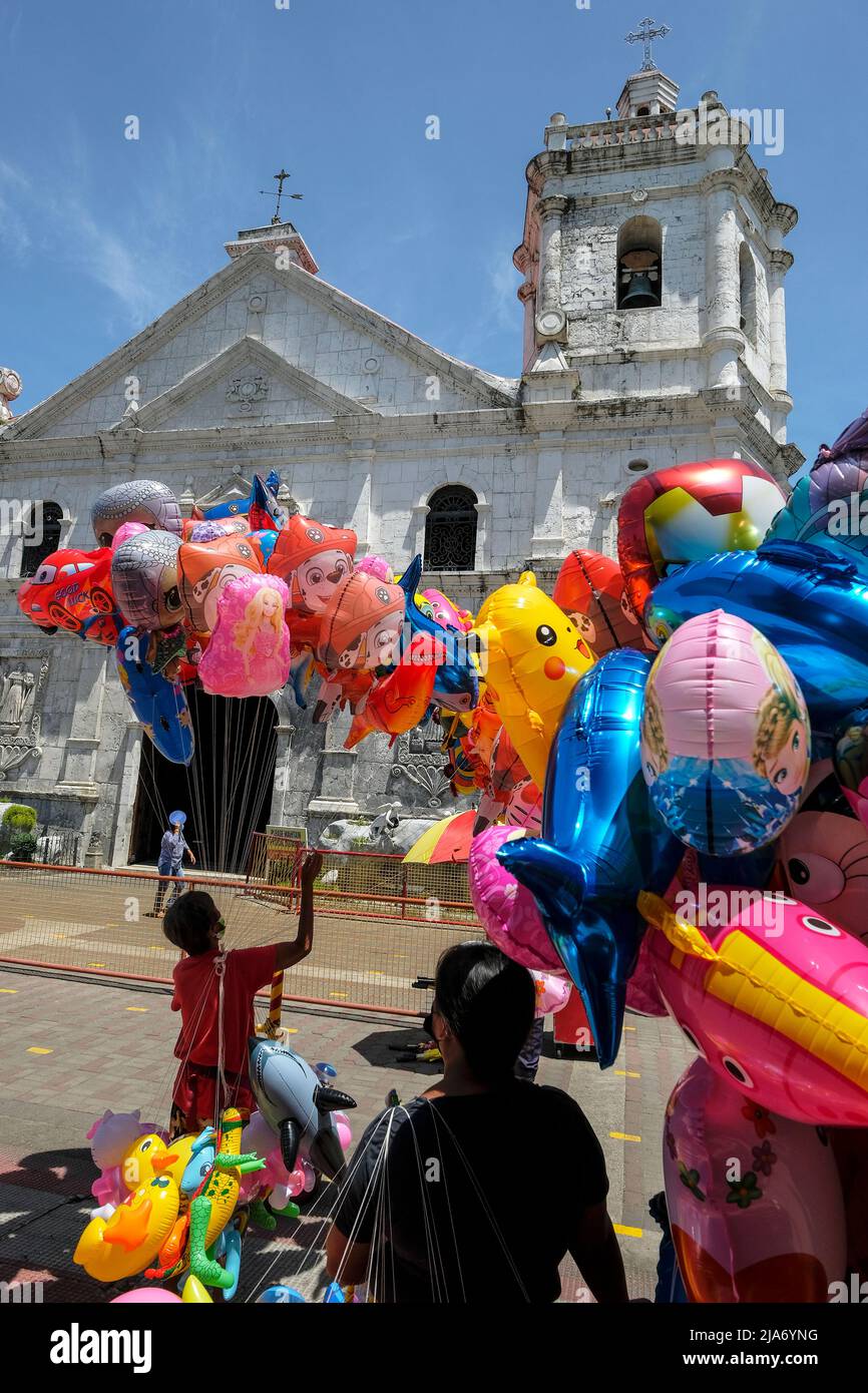 Cebu, Philippines - May 2022: Balloon vendors at the Basilica Minore ...