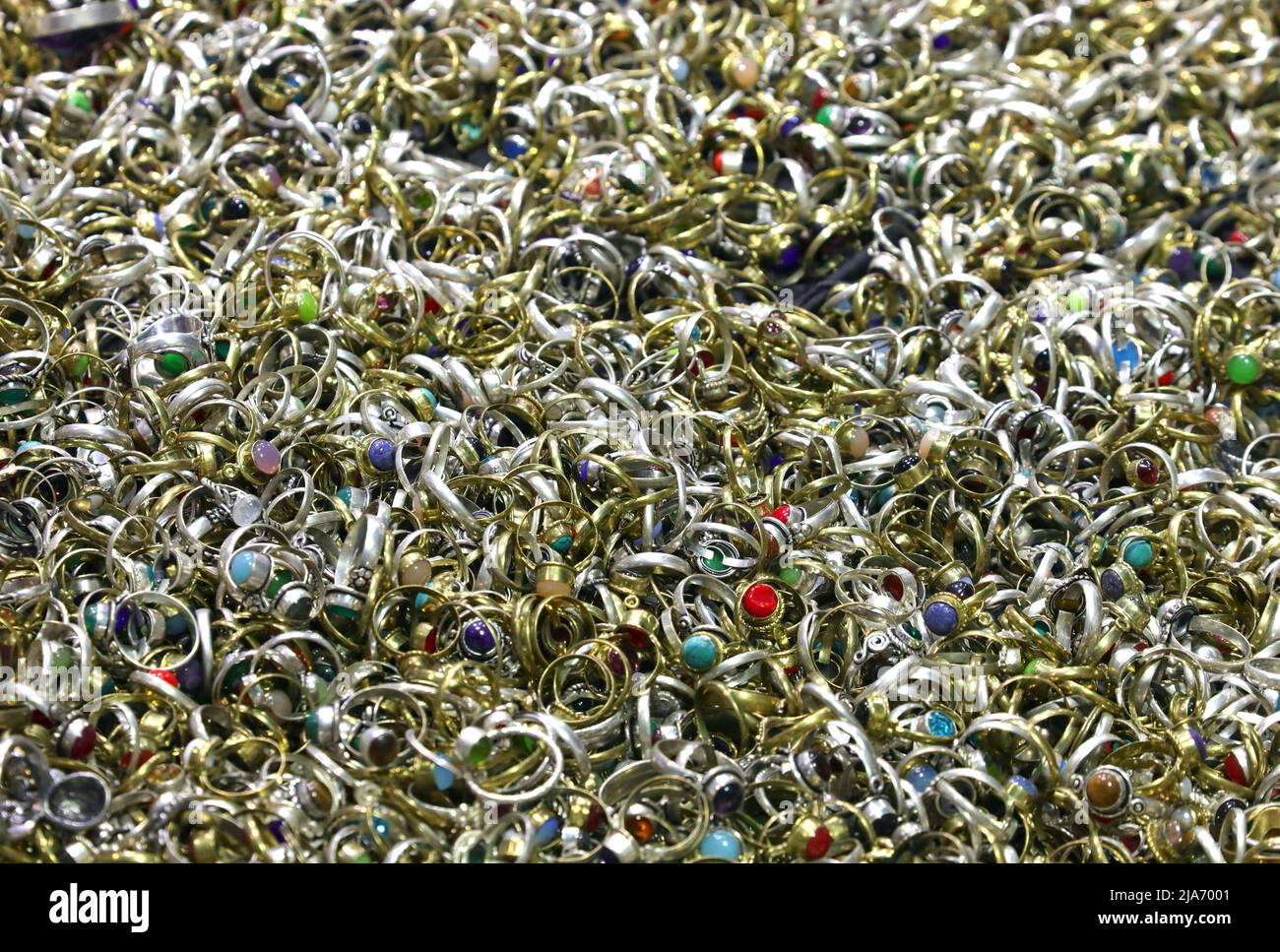 background of hundreds of metal rings with or without the precious ...