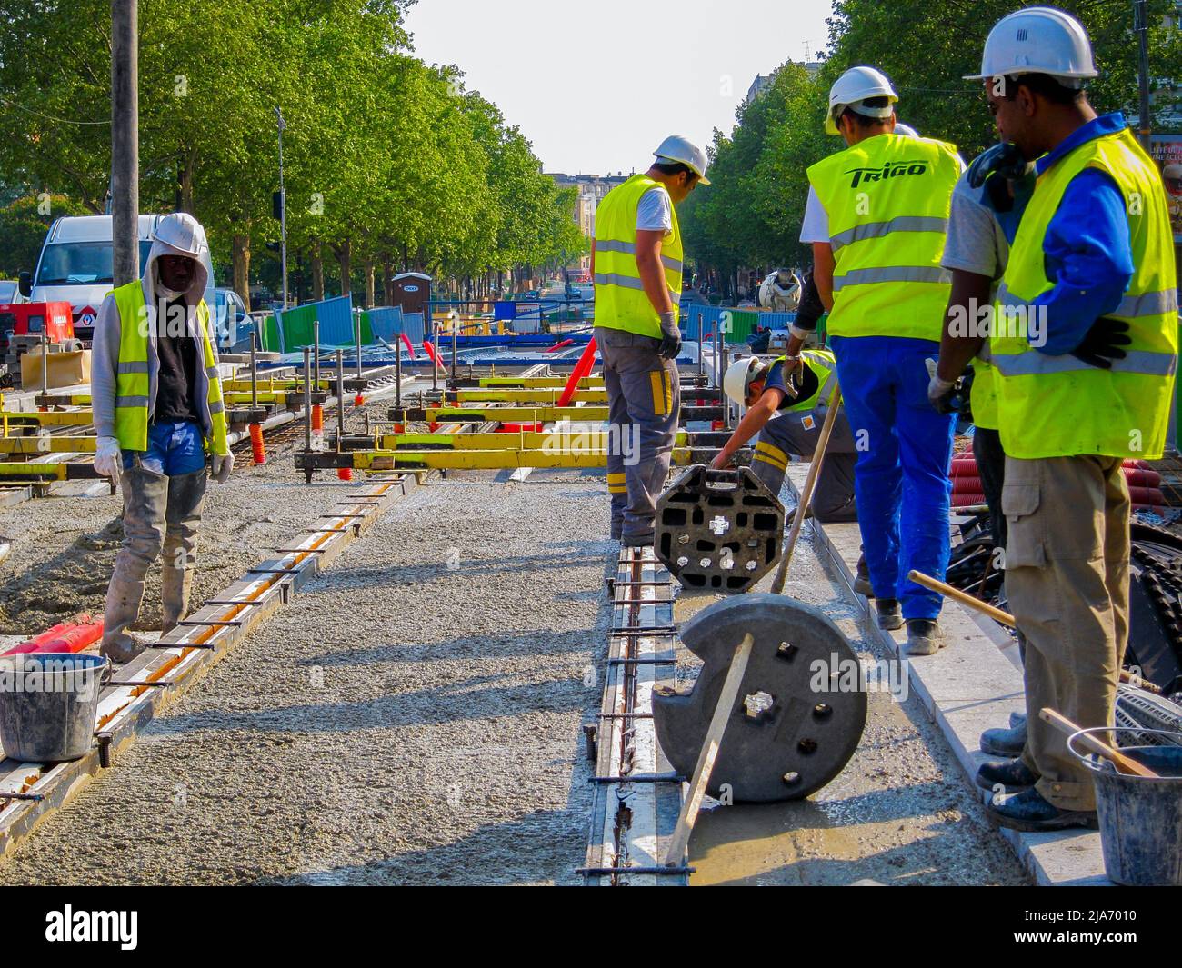 Paris, France, Group Migrant Construction Workers Applying Concrete to ...