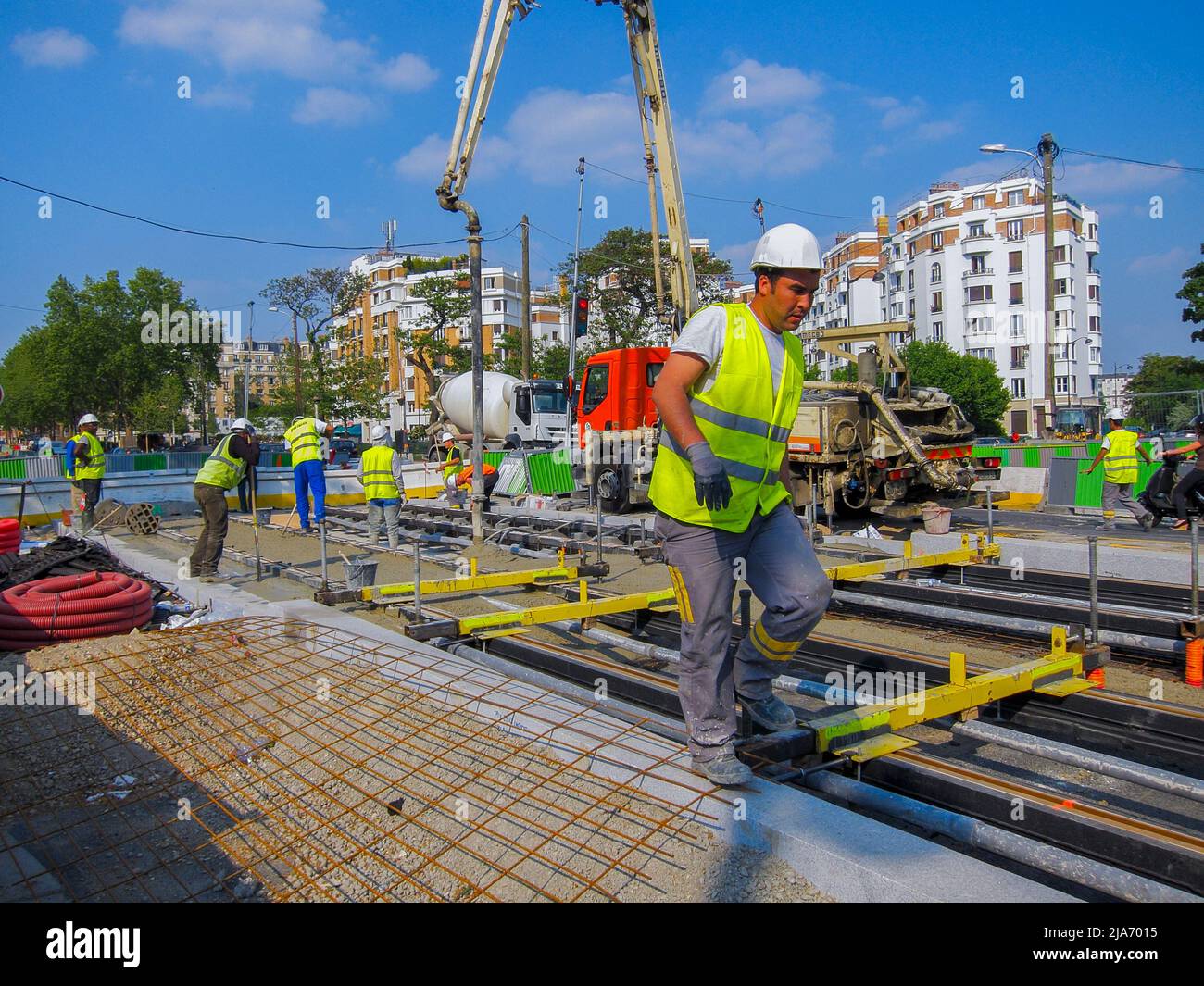 Paris, France, Construction Workers Applying Concrete to Tram Tracks on ...