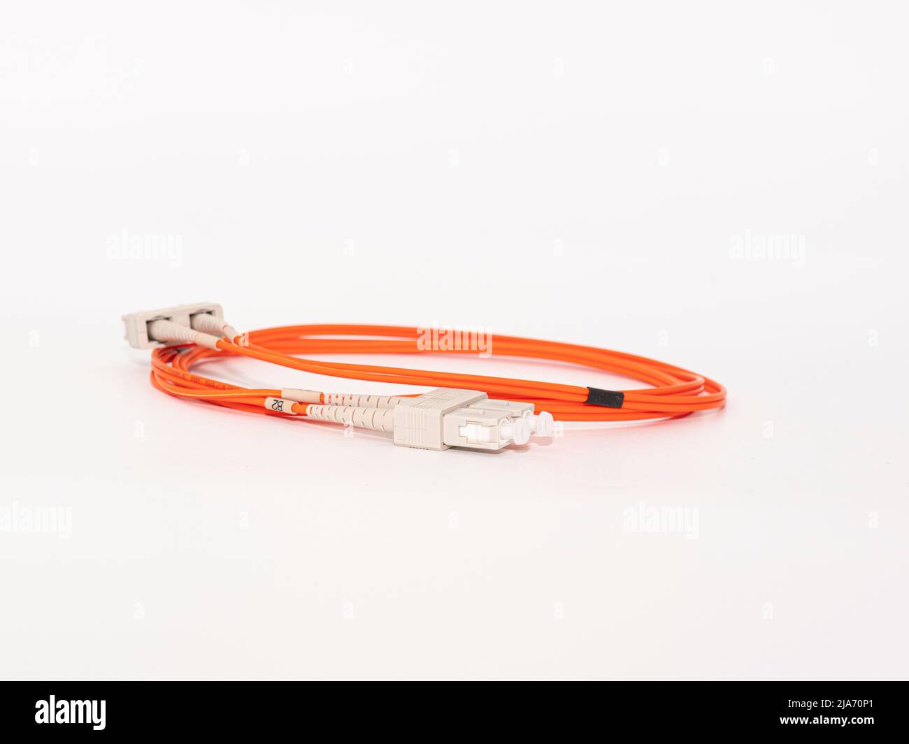 Fiber Optic Patch Cord on isolated white background Stock Photo - Alamy