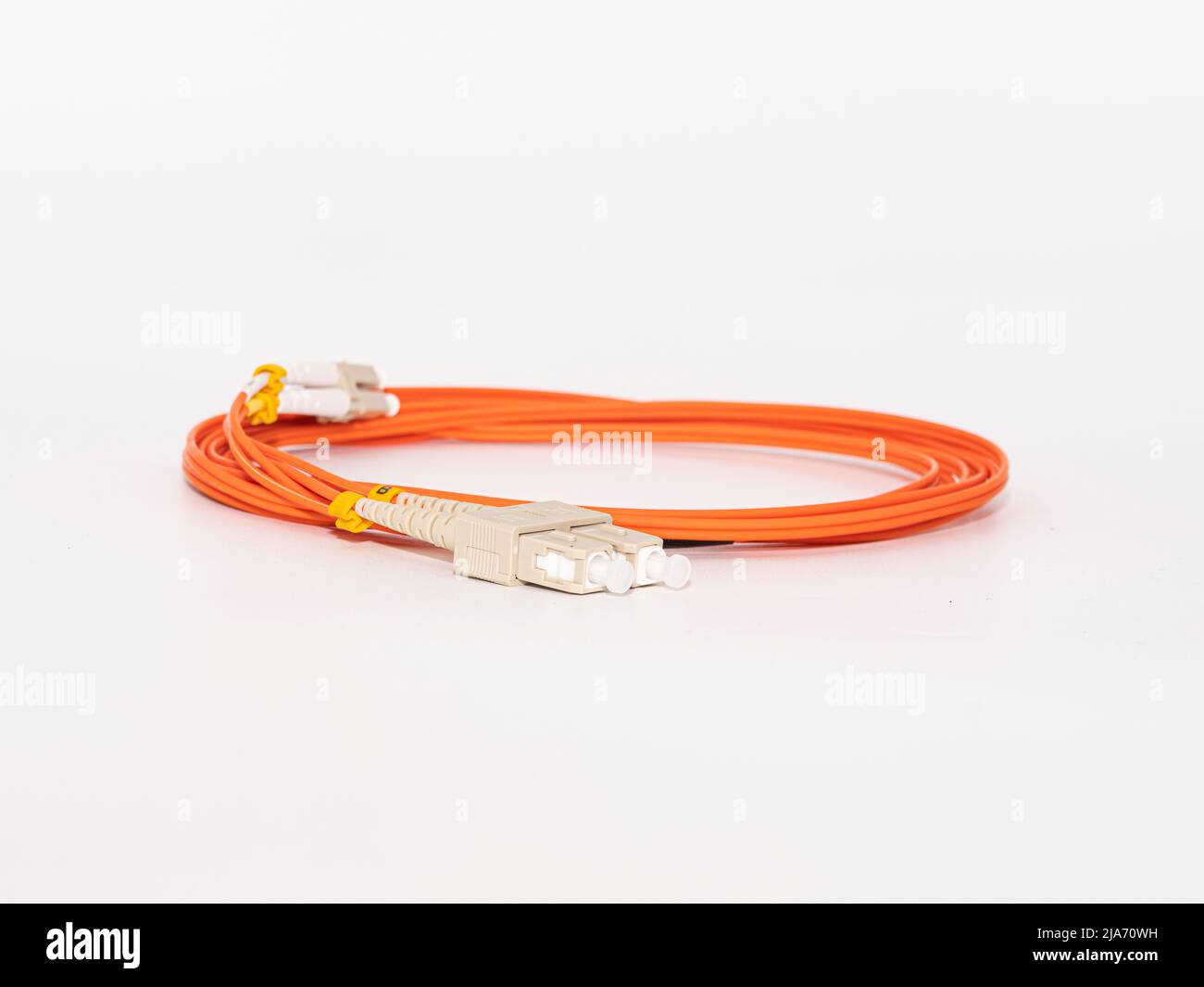 Fiber Optic Patch Cord on isolated white background Stock Photo - Alamy