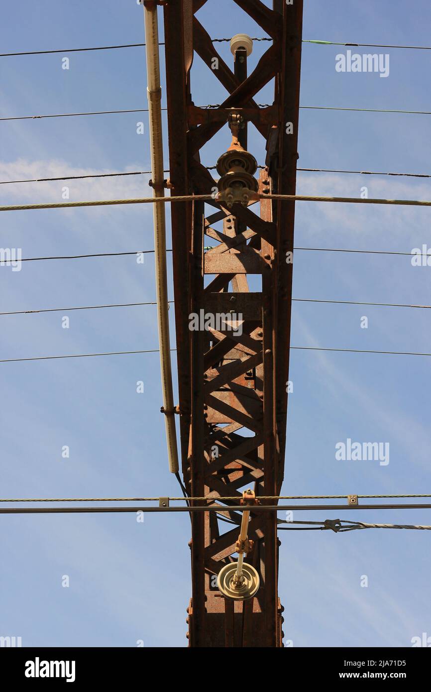 An overhead vintage steel truss with electrical power cables Stock ...