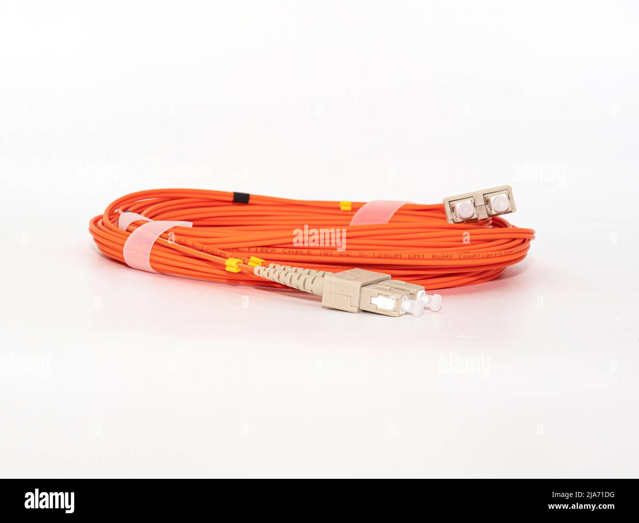 Fiber Optic Patch Cord on isolated white background Stock Photo - Alamy