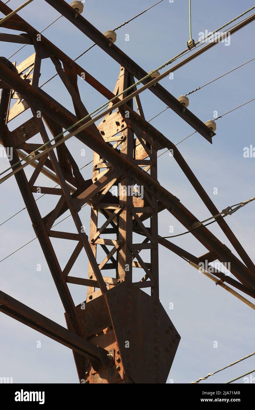 A steel truss power tower against the sky Stock Photo - Alamy