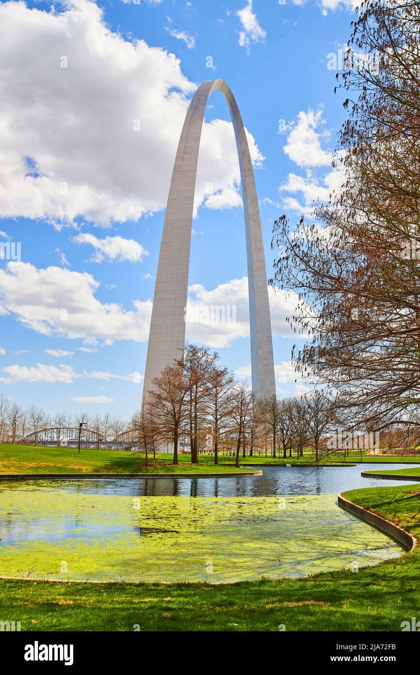Iconic Gateway Arch in St. Louis by pond in early spring Stock Photo ...
