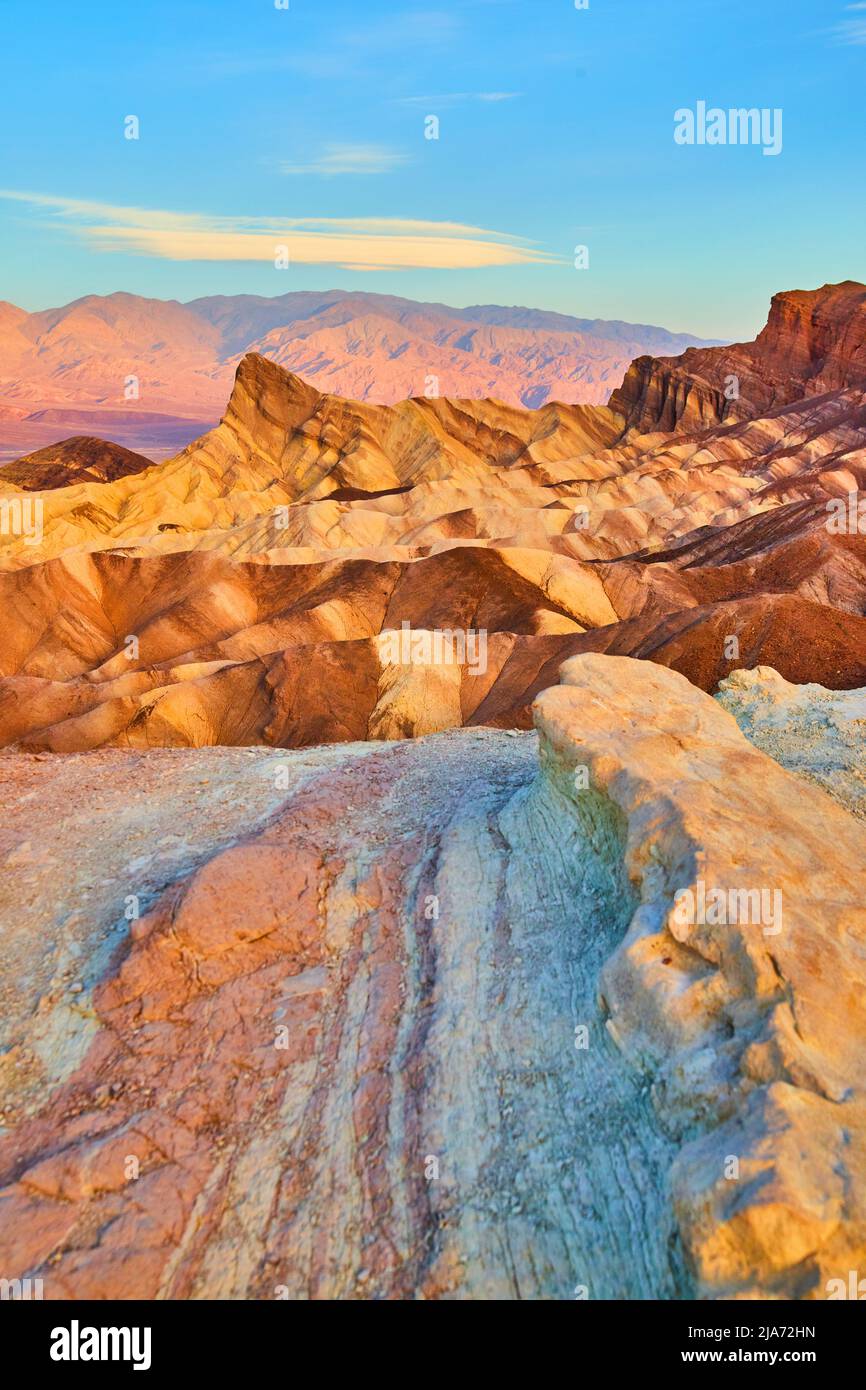 Death Valley waves of colors in mountains at sunrise Stock Photo - Alamy