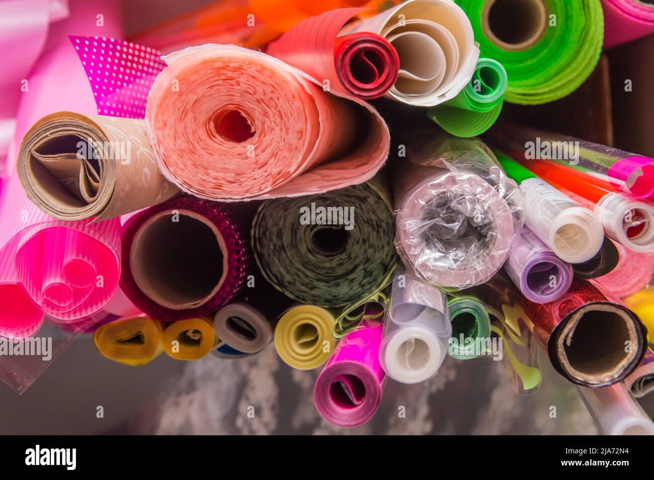 Rolled up plastic or polyethylene colored packaging object wrapper ...