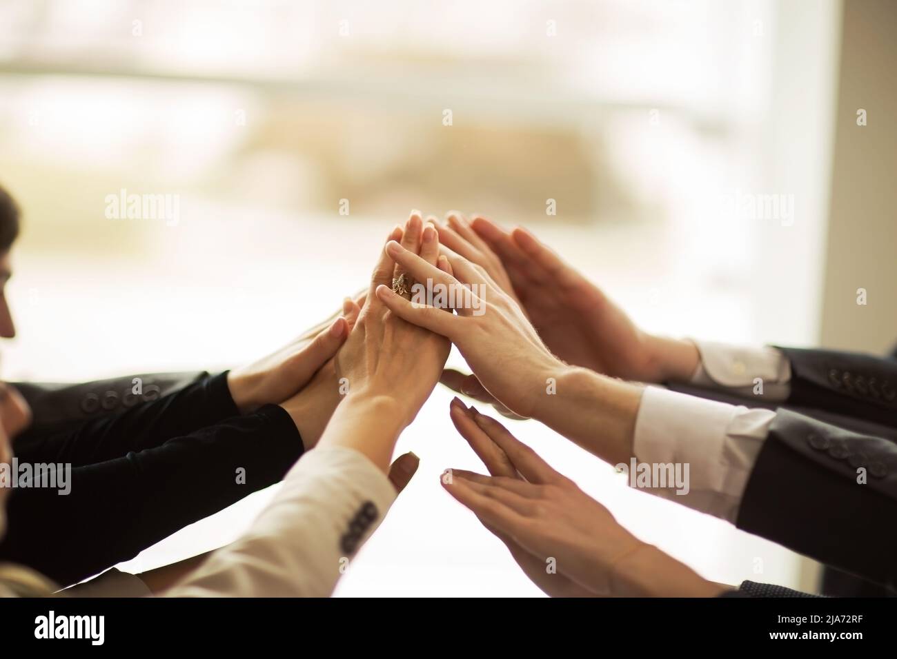 The conference of entrepreneurs. The folding of hands together and ...